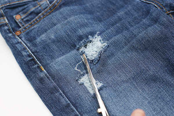 How to Distress Jeans Tutorial - Sew Much Ado