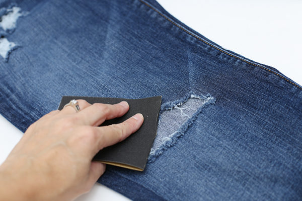 How to Distress Jeans Tutorial - Sew Much Ado